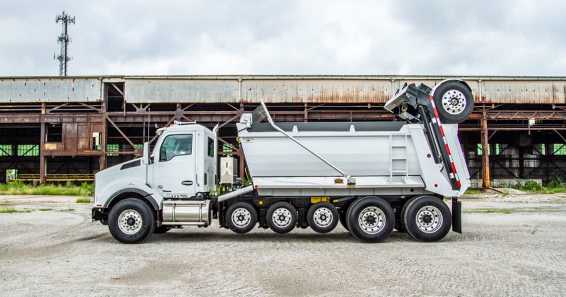 Quad Axle Super Dump on Kenworth – Custom Truck One Source