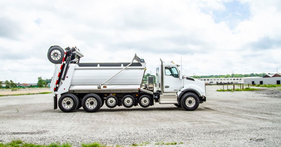 Quad Axle Super Dump on Kenworth – Custom Truck One Source