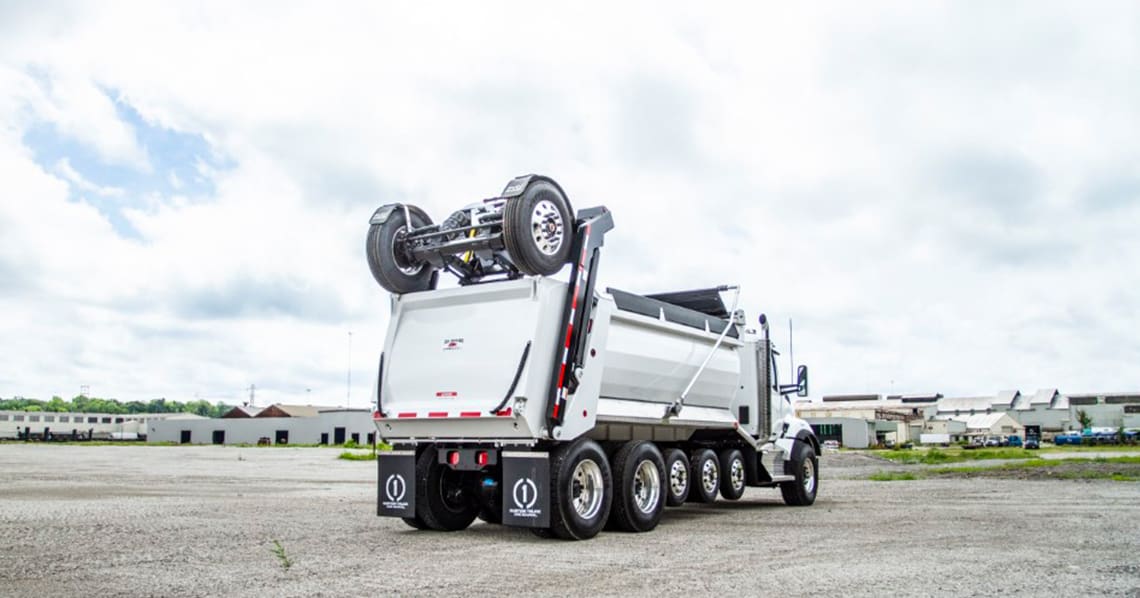 Quad Axle Super Dump on Kenworth – Custom Truck One Source