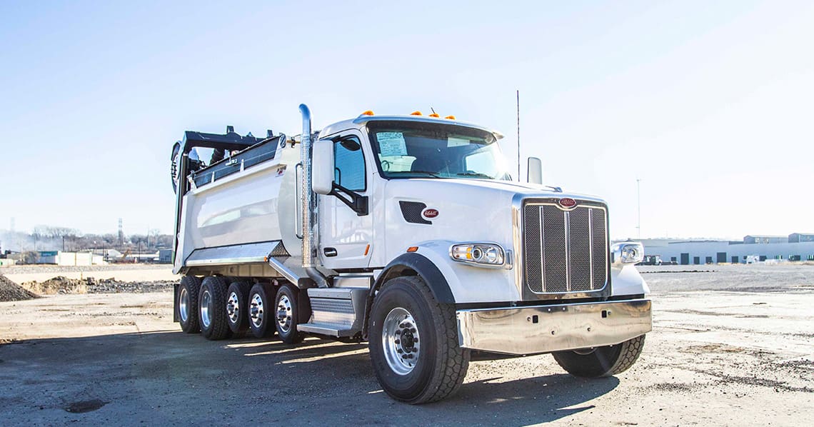 Quad Axle Super Dump on Peterbilt – Custom Truck One Source